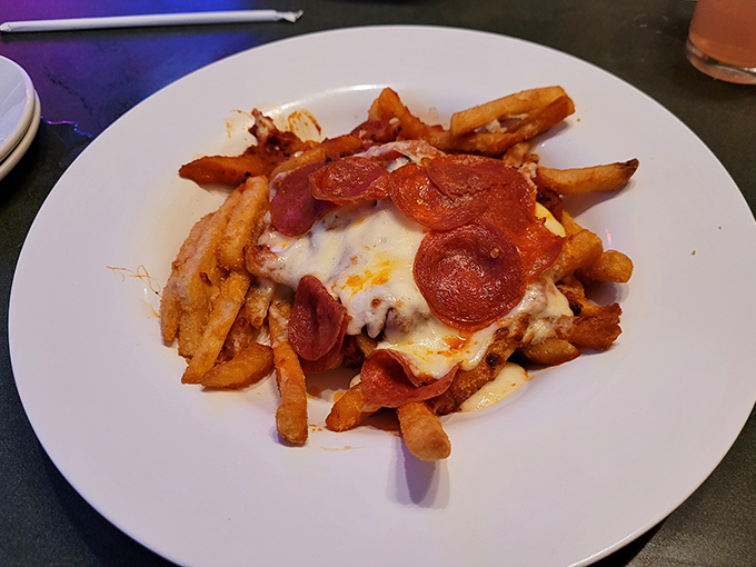 Pizza fries: where two comfort food favorites collide in a melty, pepperoni-topped romance that would make your cardiologist wince.