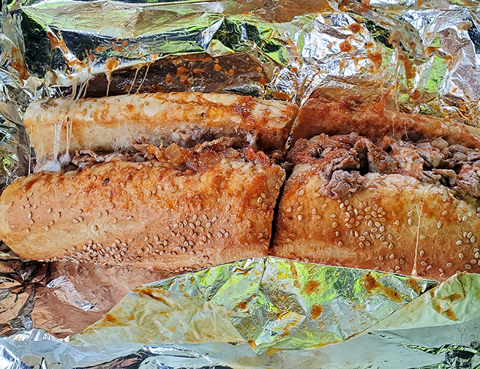 The pizza steak sub—where Italian tradition meets Philadelphia innovation in a handheld masterpiece that demands to be savored slowly.