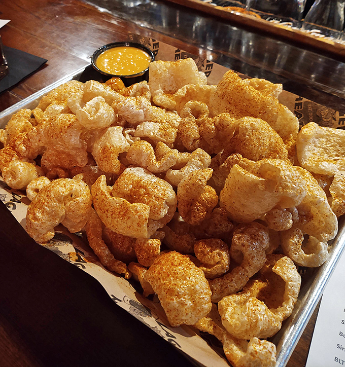 These aren't your gas station pork rinds. Dusted with house seasoning and served with dipping sauce, they're crispy little clouds of porky perfection.