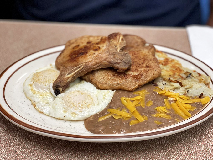 Pork chops and eggs with a side of cheesy beans &ndash; the breakfast equivalent of hitting the culinary jackpot at 9am.