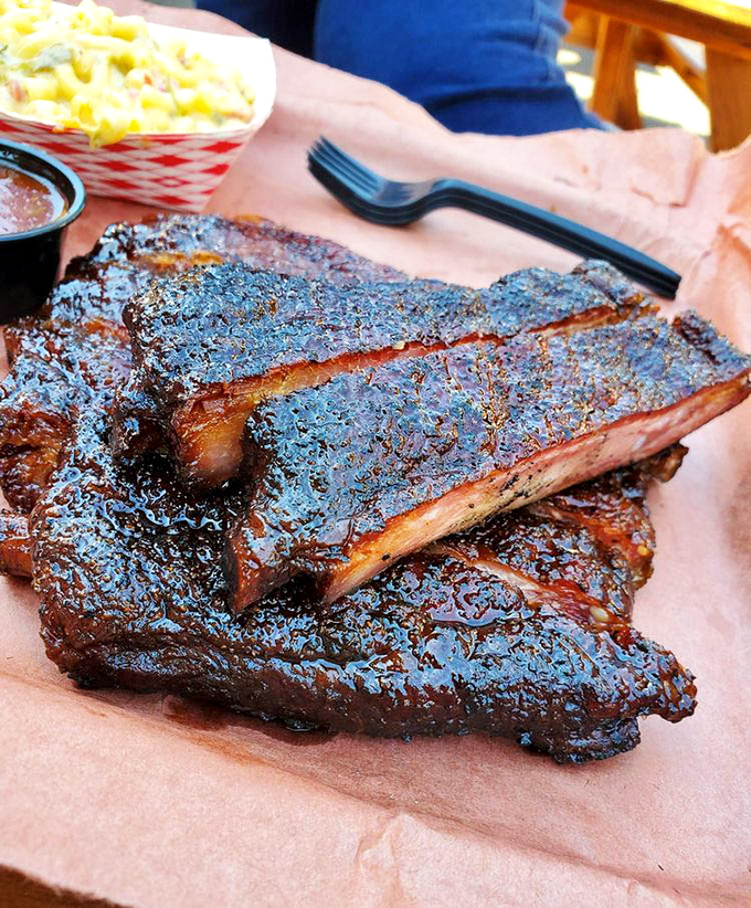 Ribs so lacquered and glistening they belong in a museum. That bark contains more flavor than most five-course meals.