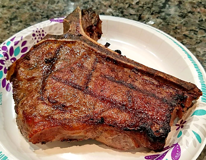 This isn't just a steak&mdash;it's a statement. The bone-in ribeye's marbling creates a buttery tenderness that makes conversation stop mid-sentence.