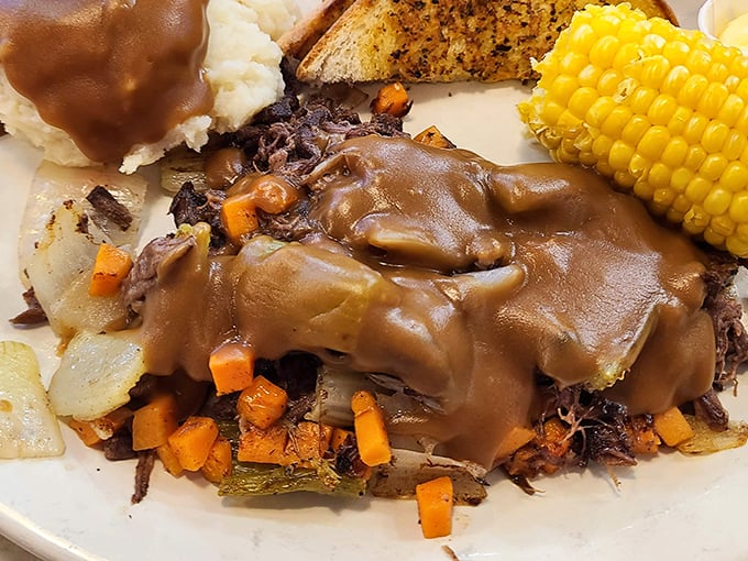 This pot roast doesn't just fall apart&mdash;it surrenders completely, surrounded by vegetables that have soaked up all those savory juices. Comfort food that hugs you from the inside.