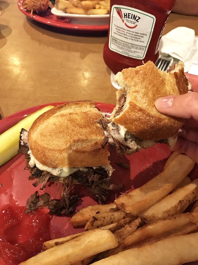 When pot roast meets sandwich perfection, magic happens &ndash; just look at that cheese stretching like edible gold between the halves.