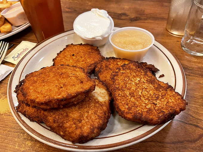 Potato pancakes with the perfect crisp-to-tender ratio. These golden discs have launched a thousand "my grandmother's were almost this good" debates.