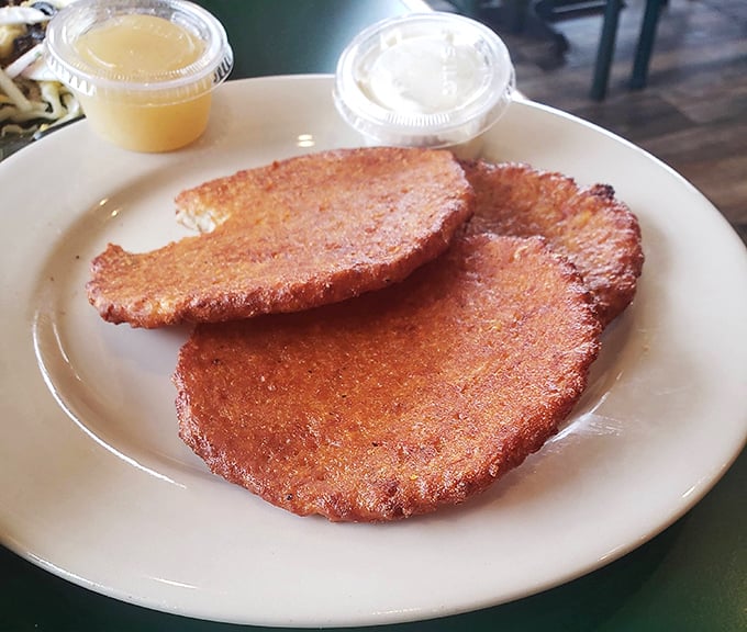 These potato pancakes aren't just fried&mdash;they're transformed into crispy, golden discs of comfort that could settle international disputes if given the chance.