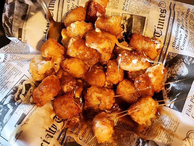 Golden cheese curds swimming in gravy create comfort food magic that would make any Canadian weep tears of joy.