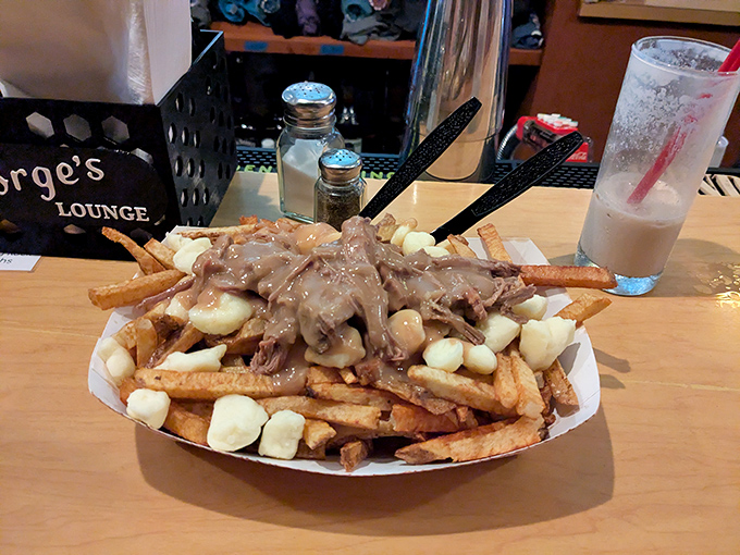 Hand-cut fries that could make a French chef weep, paired with a burger that belongs in the comfort food hall of fame.