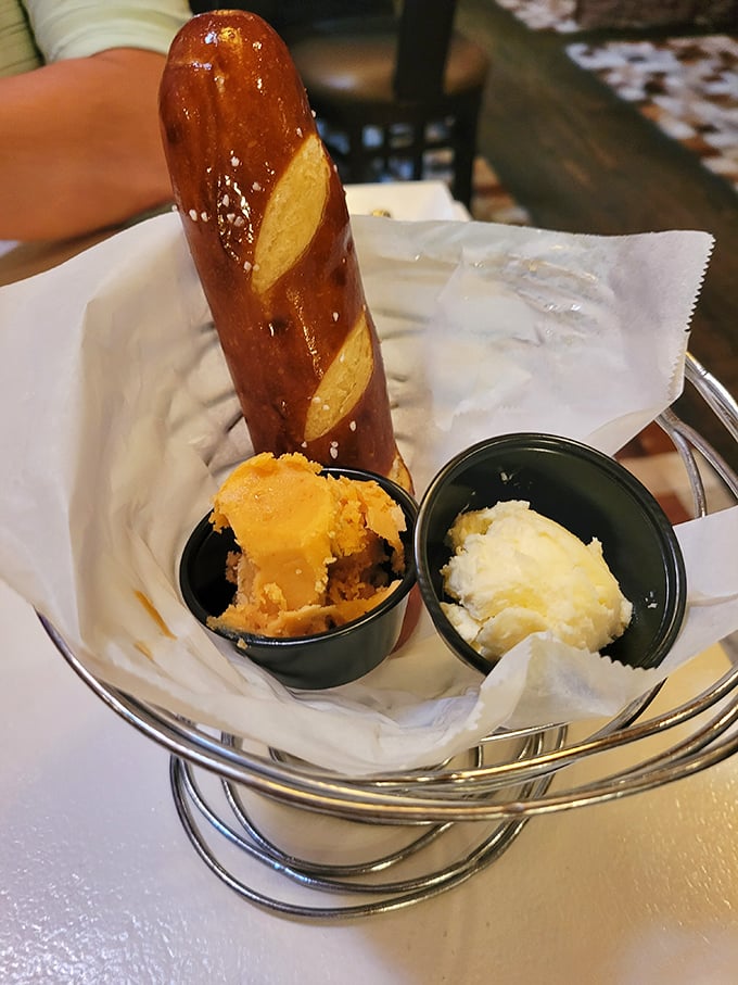 Pretzel breadsticks: the unsung heroes of appetizers, standing at attention like delicious sentinels guarding their buttery companions.