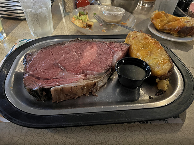 Prime rib so perfectly pink it should be on a magazine cover. That baked potato isn't just a side&mdash;it's a worthy companion.