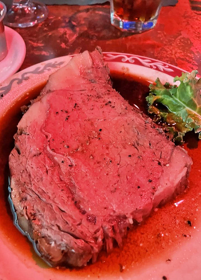 Prime rib so perfectly pink it could make a butcher weep with joy. The plate's simplicity lets the star of the show command your full attention.