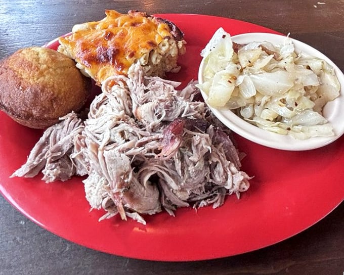 A pulled pork plate that showcases the art of patience&mdash;tender strands of smoke-kissed pork alongside mac and cheese that demands equal attention.