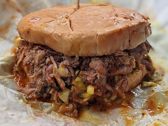 The pulled pork sandwich in its natural habitat&mdash;gloriously messy, unapologetically delicious, and worth every napkin you'll sacrifice to the barbecue gods.