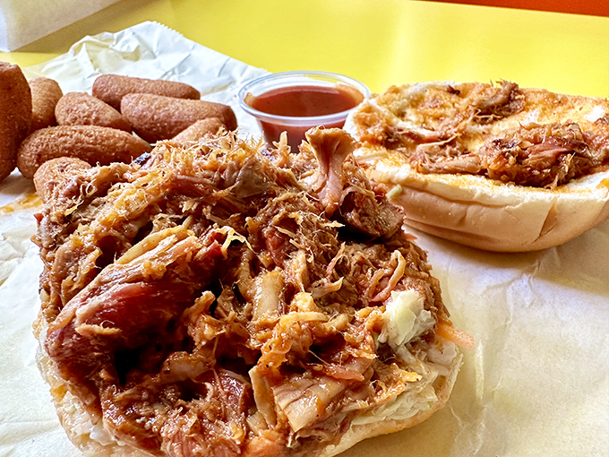 Pulled pork so tender it practically pulled itself. The sandwich that launched a thousand road trips and zero regrets.