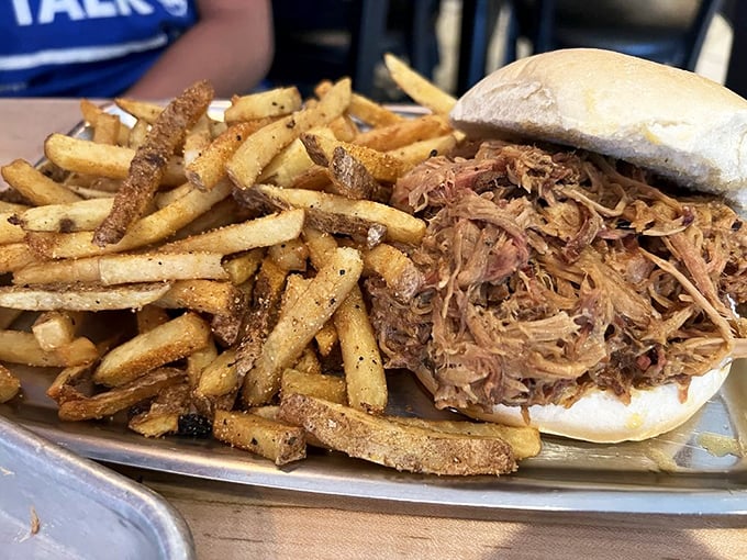 The pulled pork sandwich &ndash; where seasoned meat meets soft bun in a relationship so perfect it should have its own reality show.