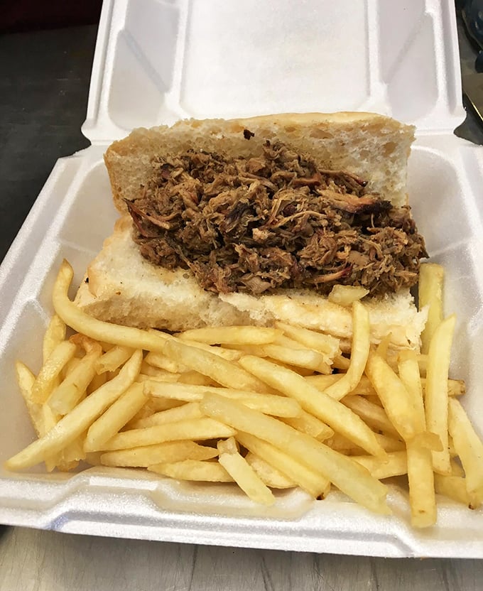 This pulled pork sandwich isn't messing around. Simple white bread knows its role: stay humble and let the star of the show shine.