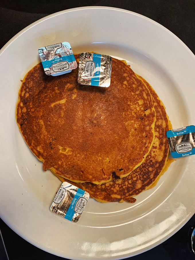 These pancakes aren't just breakfast, they're an event &ndash; golden discs adorned with butter medallions like a delicious game of edible checkers.