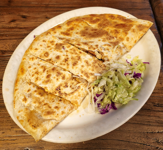 Golden-brown quesadillas with the perfect cheese pull, served with a side of fresh lettuce. Some food relationships are just meant to be.