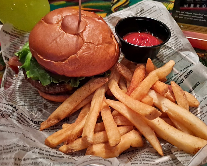 The Rainforest Burger comes dressed for the occasion, with enough toppings to require a survival strategy before your first bite.