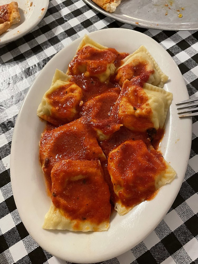 Pillowy pasta parcels stuffed with dreams and covered in sauce that tastes like liquid happiness.