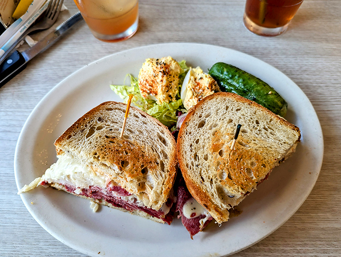 The Reuben sandwich&mdash;where corned beef, sauerkraut, and Swiss cheese perform a perfectly choreographed dance on grilled rye. The pickle is your backstage pass.
