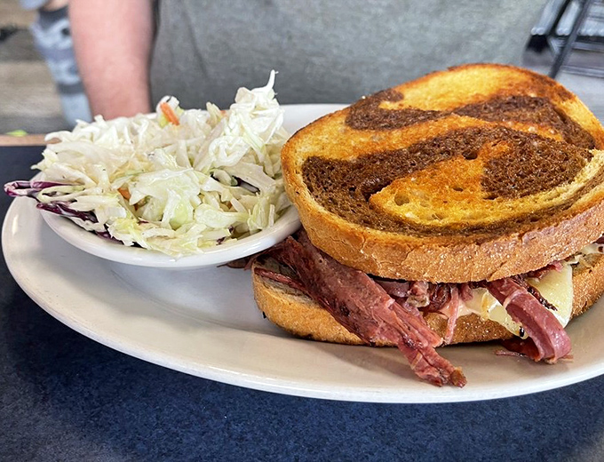 The Reuben sandwich&mdash;where corned beef, sauerkraut, and melted cheese create that perfect harmony that makes you close your eyes with each bite.