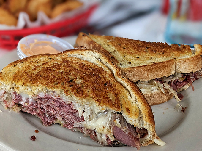 The Reuben sandwich&mdash;where corned beef meets sauerkraut in a dance as old as time. This isn't lunch; it's a religious experience between bread.