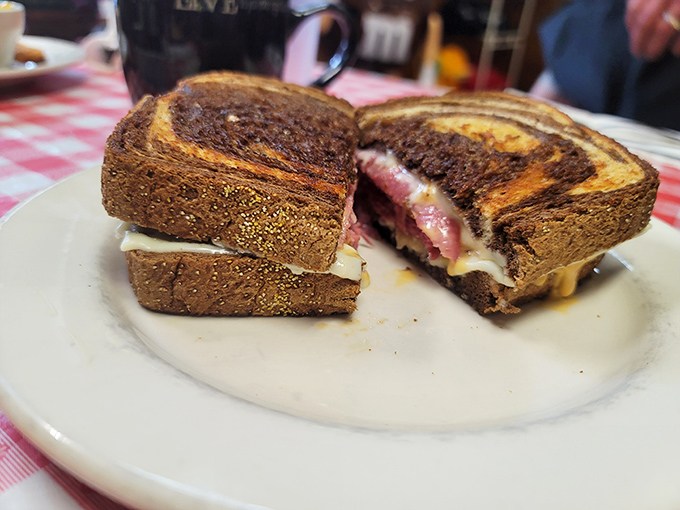 The Reuben sandwich&mdash;where toasty rye bread, melted cheese, and tender corned beef come together in perfect harmony. A diner classic done right.