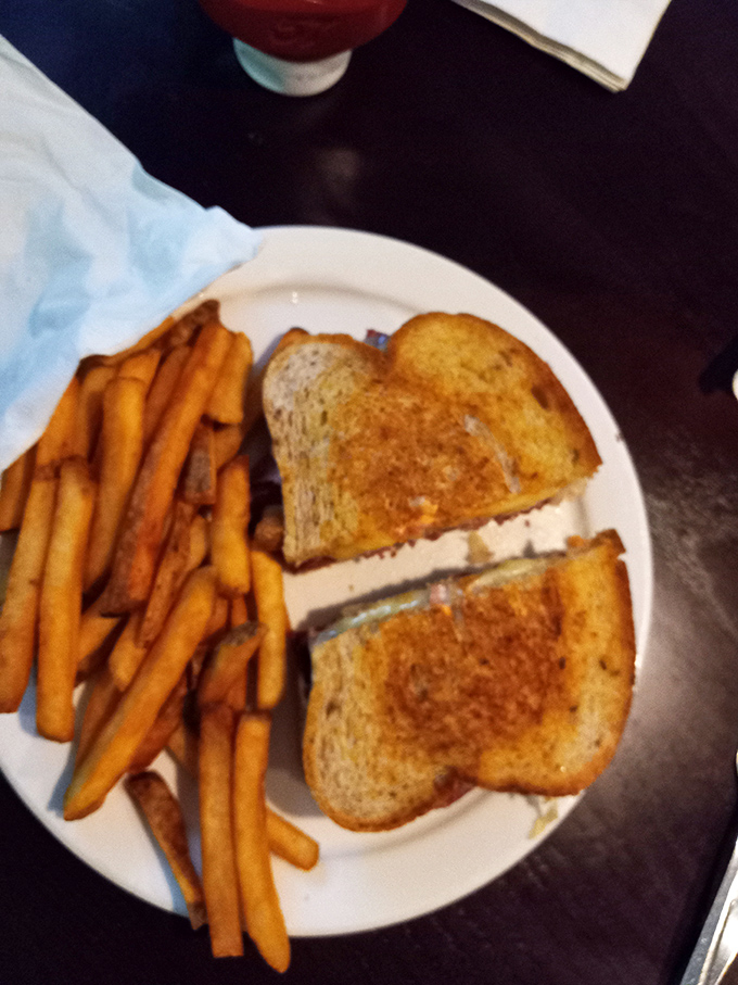 A proper sandwich requires architectural integrity. This grilled masterpiece with golden bread and generous filling stands as a testament to the art of lunch.