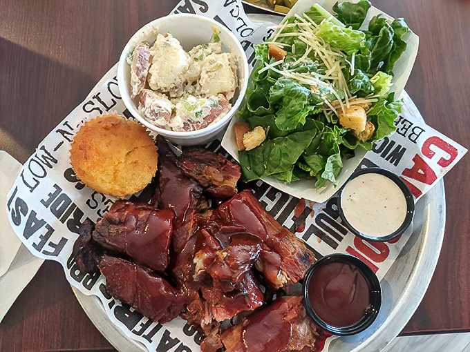 A barbecue plate that doesn't need Instagram filters&mdash;just napkins. That cornbread and potato salad aren't mere sides; they're supporting actors in a meaty drama.