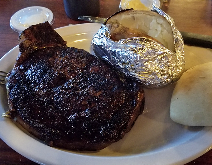 This ribeye steak looks like it graduated summa cum laude from Flavor University with honors.