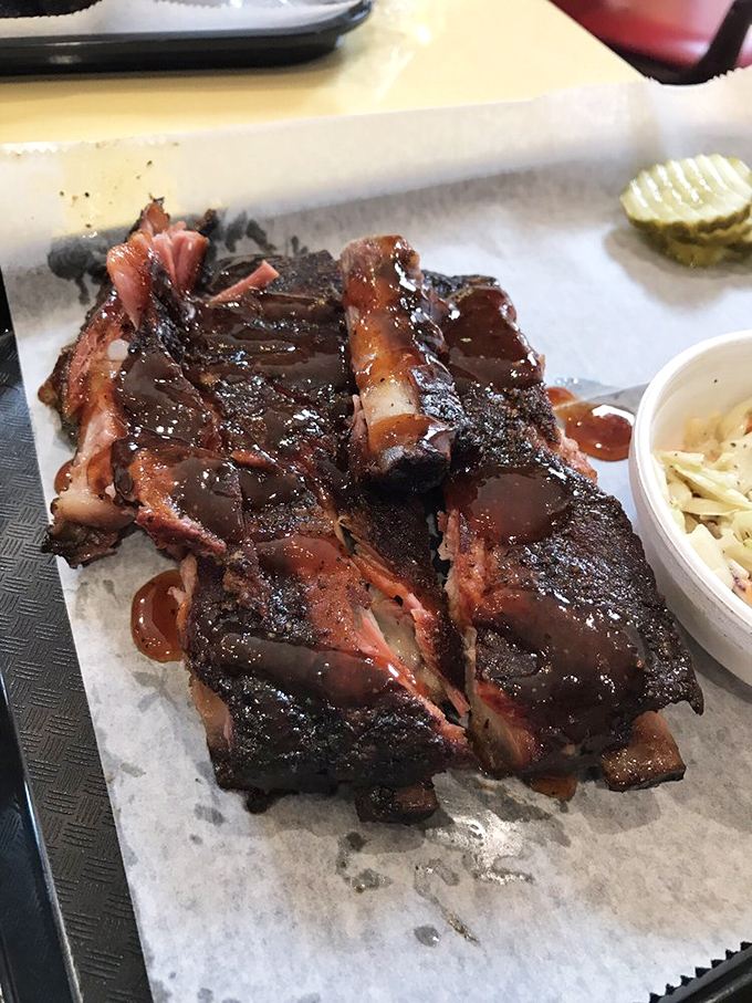 These ribs have the perfect "tug"&mdash;not falling off the bone (that's overdone) but yielding with just the right resistance. BBQ poetry in motion. 