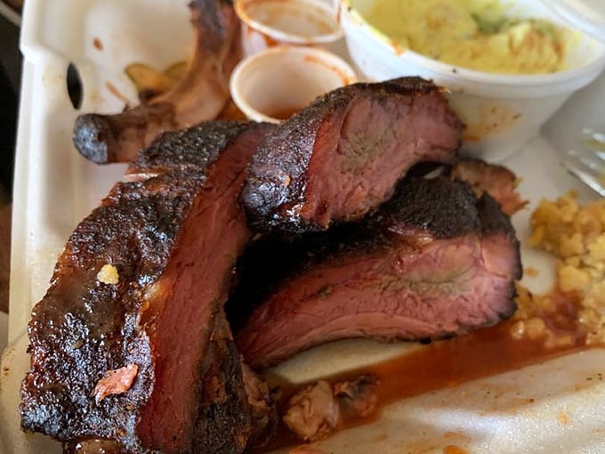 These ribs have that mahogany bark that makes barbecue lovers weak in the knees&mdash;the kind of smoke ring that should be framed and hung in a museum of meat artistry.
