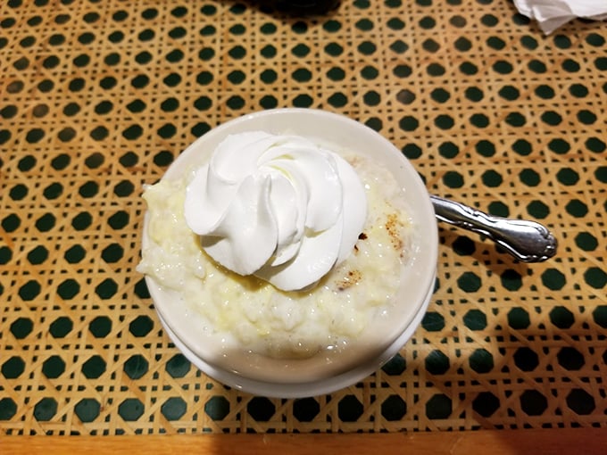 Rice pudding that would make your grandmother both proud and jealous. That dollop of whipped cream on top isn't optional&mdash;it's essential architecture.