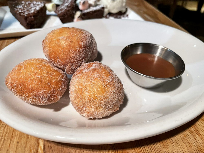 Sugar-dusted ricotta beignets with caramel dipping sauce—like New Orleans took a delicious detour through Philadelphia and left these little clouds of joy behind.