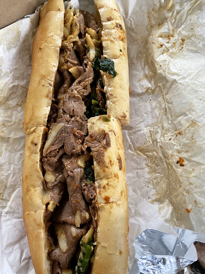 Roast beef and greens nestled in a crusty roll&mdash;proof that sometimes the simplest combinations yield the most profound satisfaction.