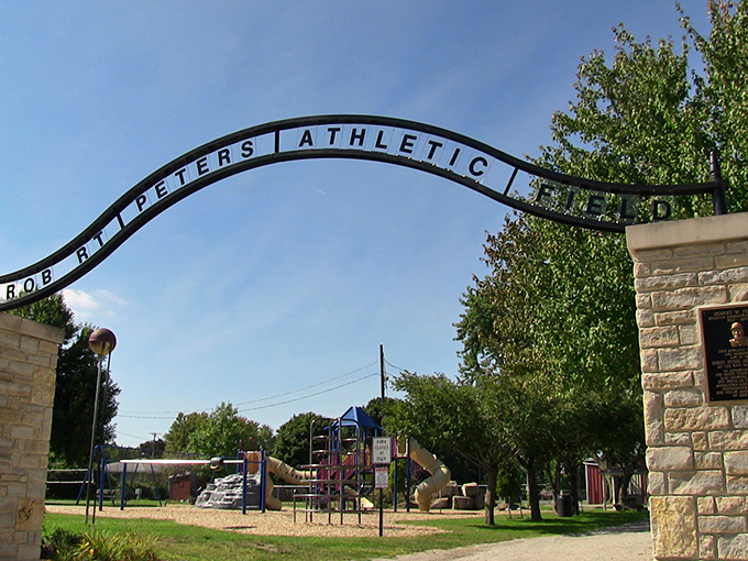 Robert Peters Athletic Park welcomes generations of cheering families under that graceful arch&mdash;where future sports legends take their first swings.