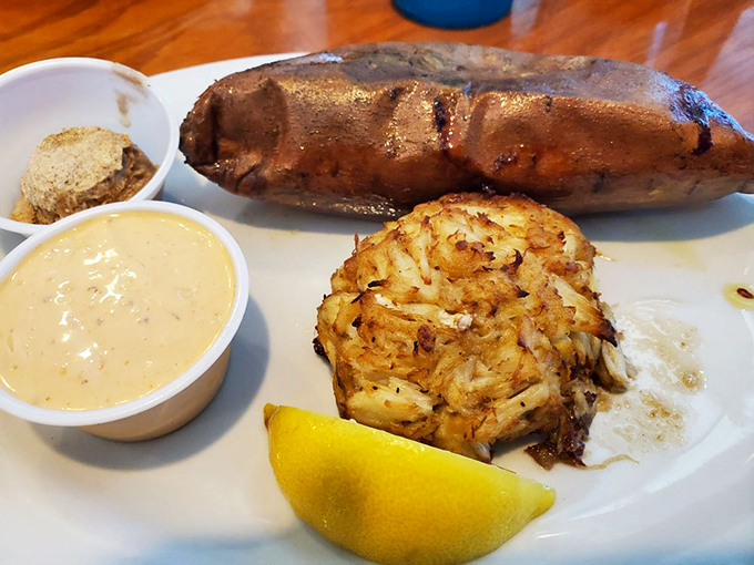 A baked potato that's seen better days meets its perfect match&mdash;a seafood spread fit for Neptune himself. Simple pleasures elevated to maritime royalty.