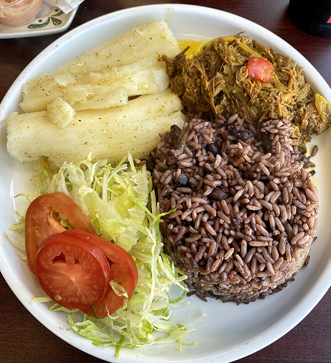 Ropa vieja with yuca and rice&mdash;tender shredded beef that's been slow-dancing with spices so long they've practically exchanged vows.