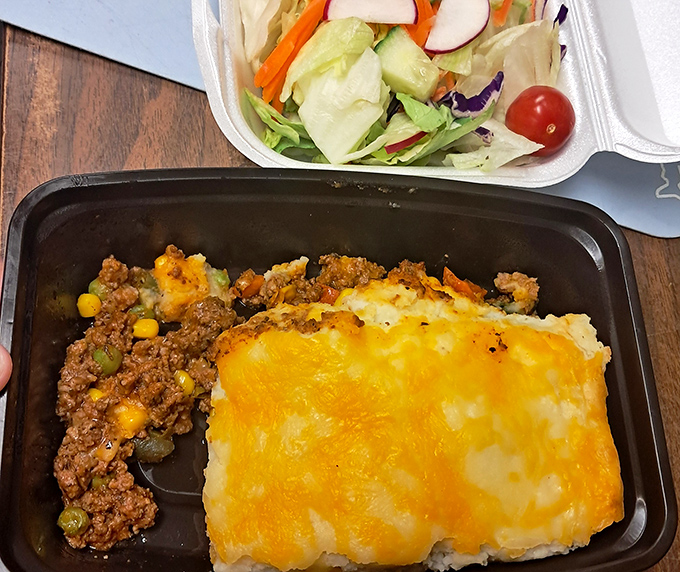 This hearty shepherd's pie-style dish proves that comfort food transcends borders. The melted cheese top creates that perfect golden crust we all fight over.