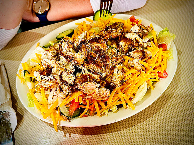 A salad that doesn't apologize for being delicious &ndash; grilled chicken atop a bed of fresh ingredients that even vegetable skeptics can embrace.