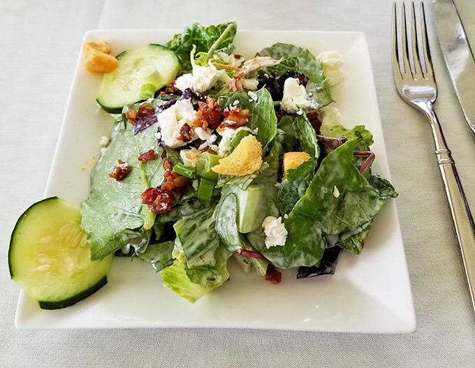 A salad that actually deserves your attention. Crisp greens, crumbled cheese, and those little crunchy bits that make you forget you're eating vegetables.