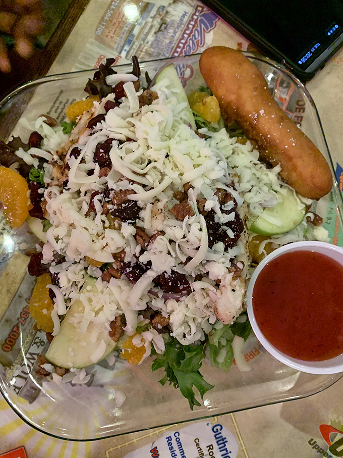 A salad that actually makes you forget you're eating healthy &ndash; crisp greens, tangy dressing, and enough toppings to feel like you're getting away with something.