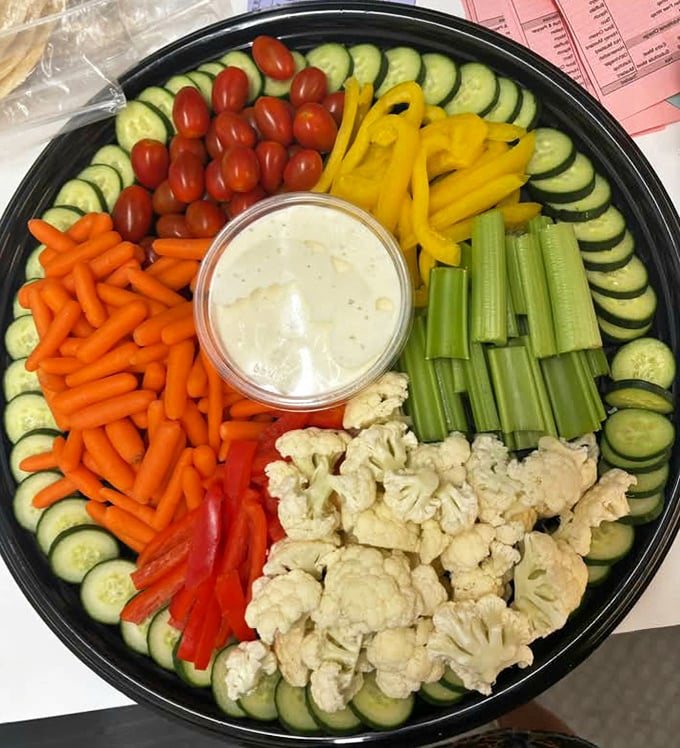 A veggie tray that puts party platters to shame, arranged with the kind of care usually reserved for Renaissance paintings.