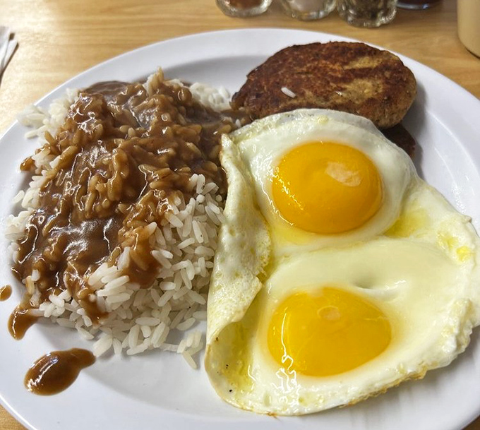 Rice and gravy alongside perfectly cooked eggs &ndash; proof that breakfast doesn't need to be complicated to be extraordinary.