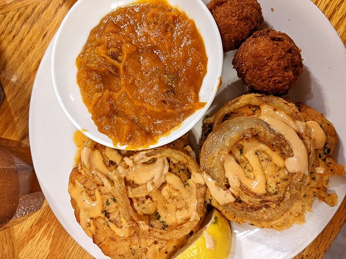 Crispy croquettes drizzled with secret sauce sit alongside what appears to be she-crab soup&mdash;a Southern duet that sings of coastal Carolina.