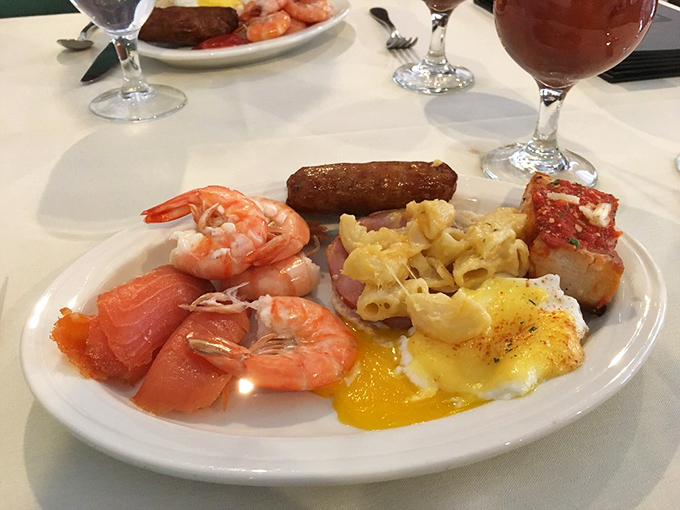 A plate that's having an identity crisis in the best way&mdash;part breakfast, part seafood feast, all delicious with those plump, pink shrimp.