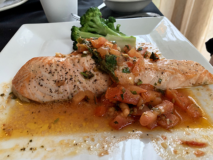 Salmon Piccata showcases perfectly seared fish with capers that pop like little flavor bombs on your tongue.