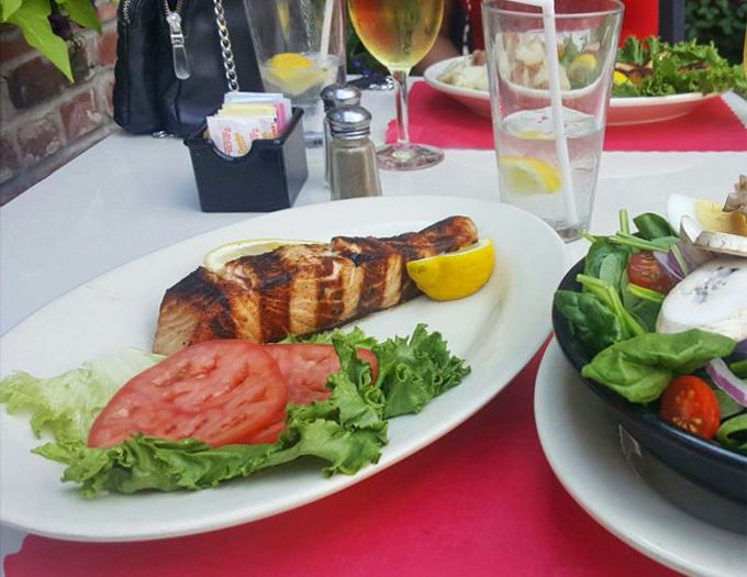 Not all heroes wear capes&mdash;some come perfectly grilled with a lemon wedge, proving Tessaro's mastery extends beyond the burger universe.