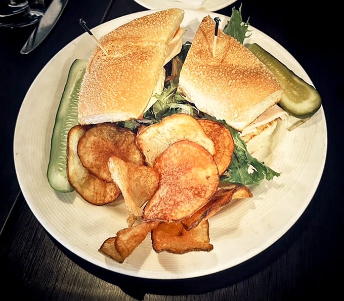 Crispy house-made chips flank a sandwich that's built for satisfaction, not Instagram&mdash;though it deserves the spotlight anyway.